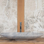 Lavabo ellittico in travertino "Elipse Ice" - Pietre di Rapolano